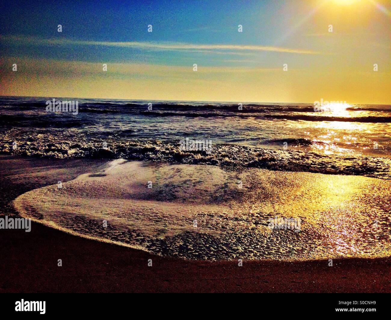 Early morning on the beach Stock Photo - Alamy