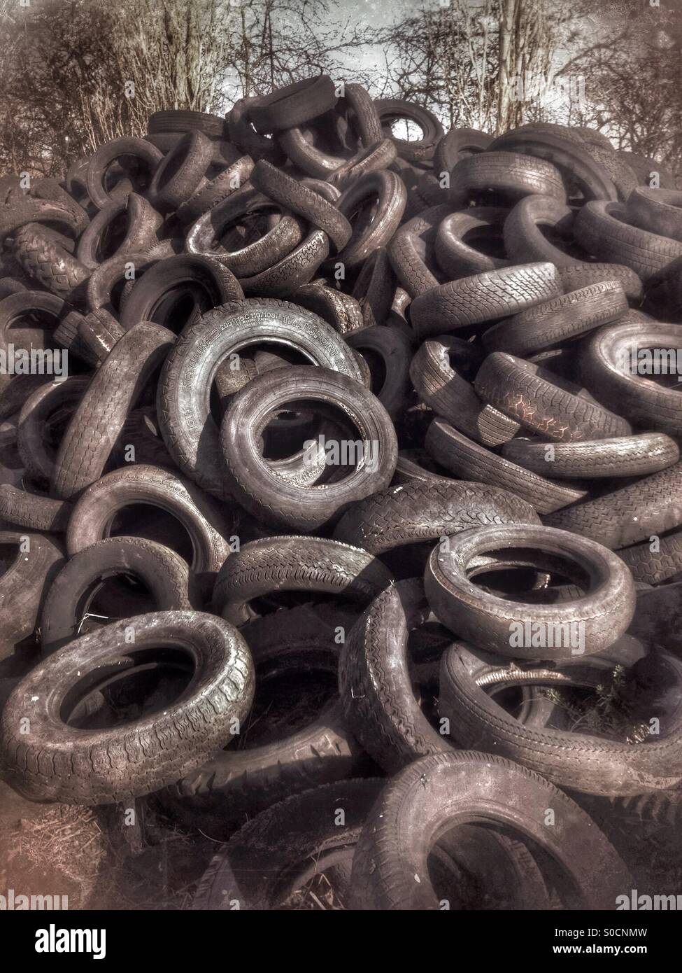 Pile of tyres Stock Photo - Alamy