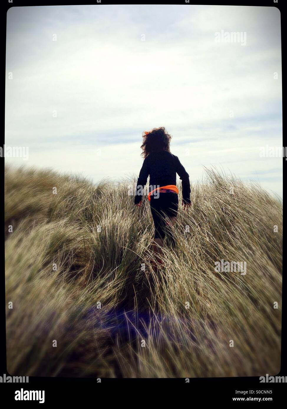 Walking in the grass hi-res stock photography and images - Alamy