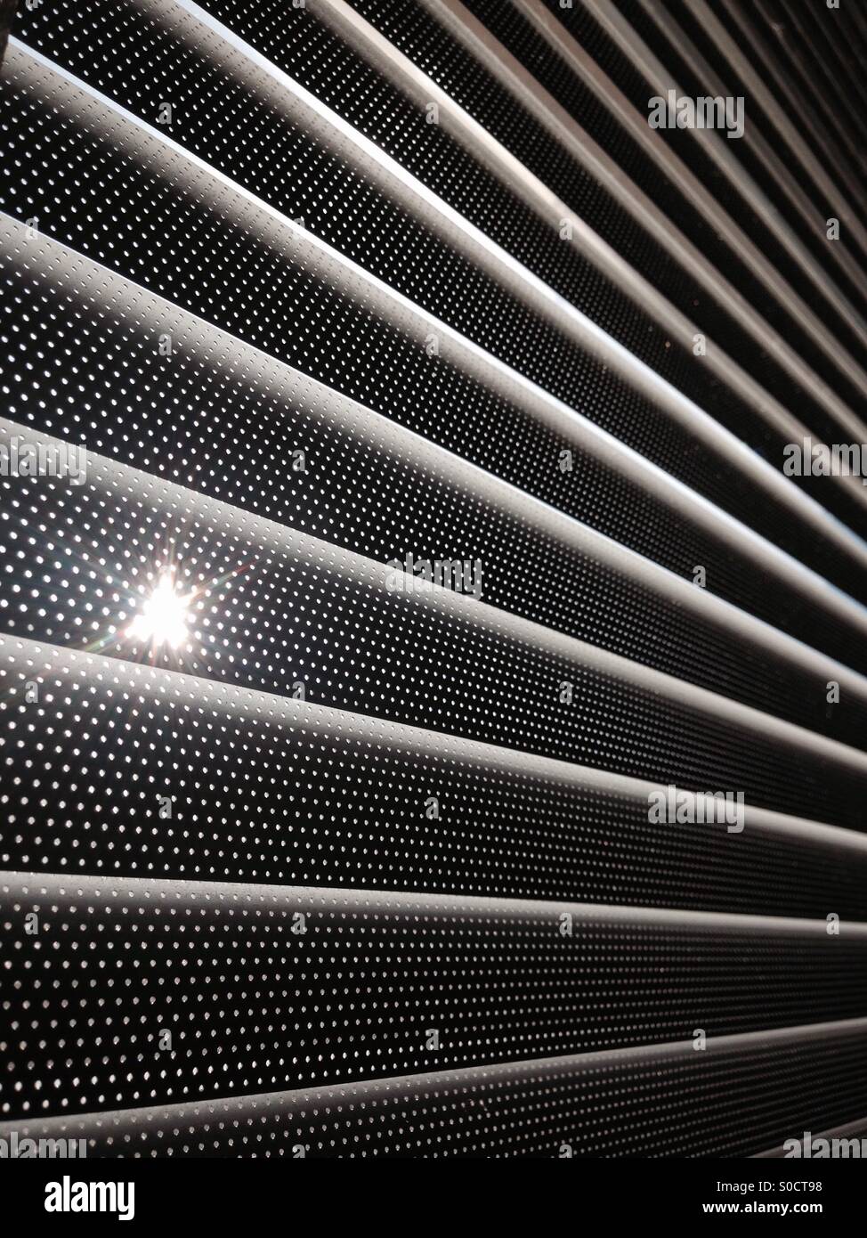 Sun shining through venetian blind Stock Photo - Alamy