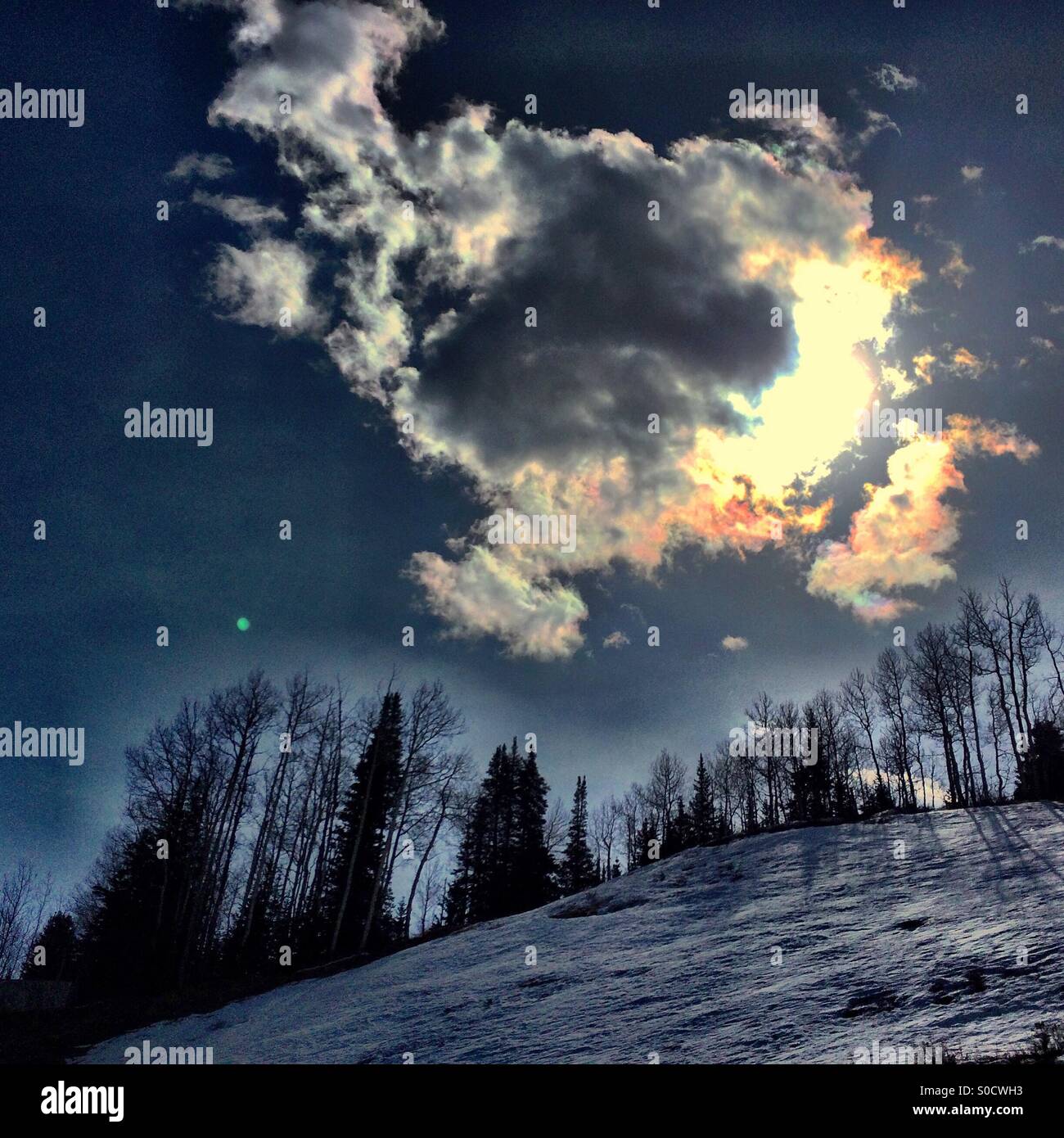Sun behind cloud hi-res stock photography and images - Alamy