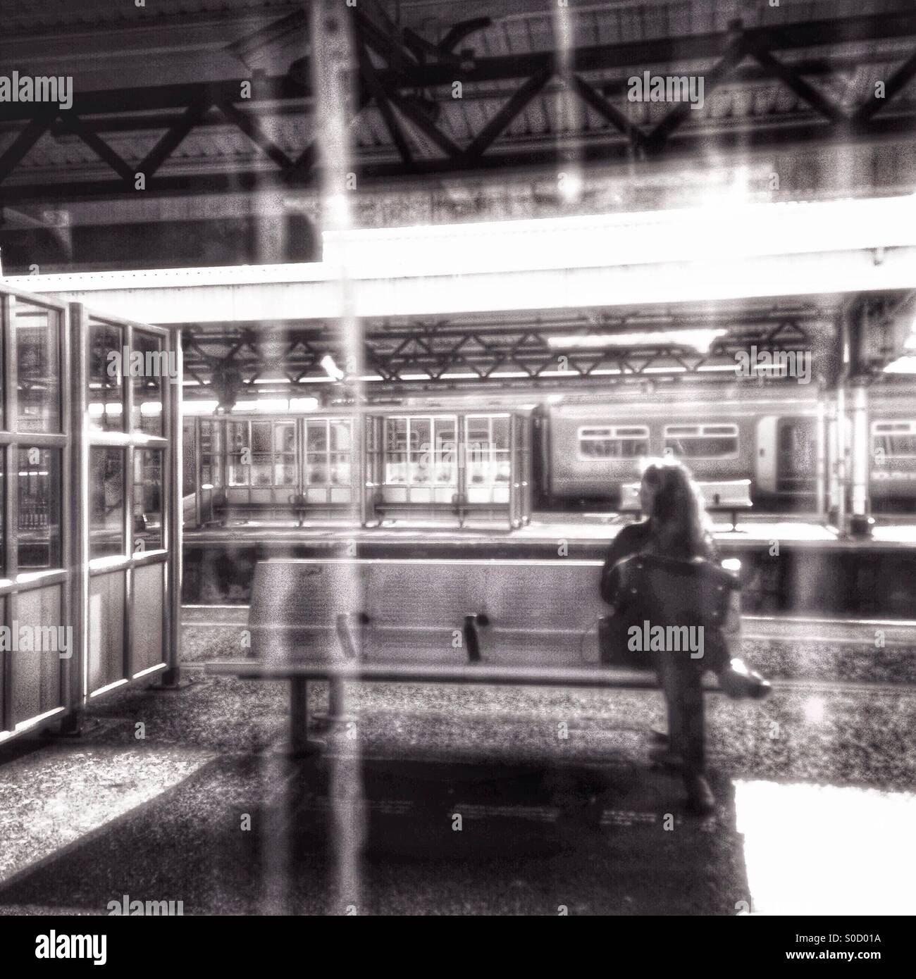 Female sat on bench hi-res stock photography and images - Alamy
