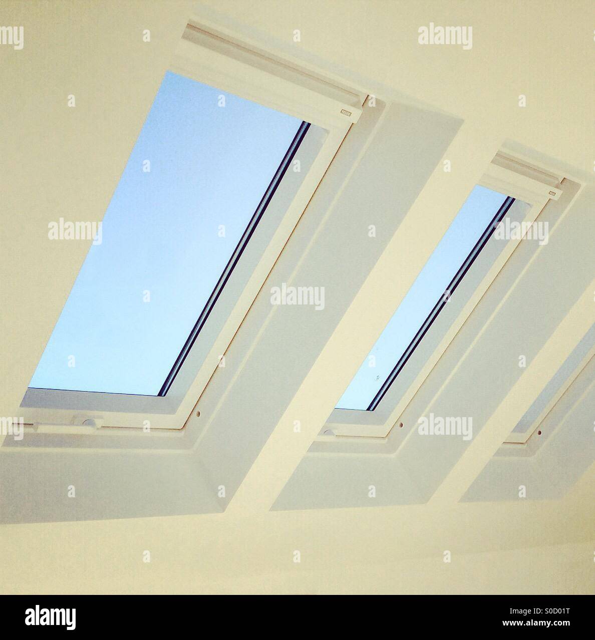 Roof windows in loft conversion Stock Photo - Alamy