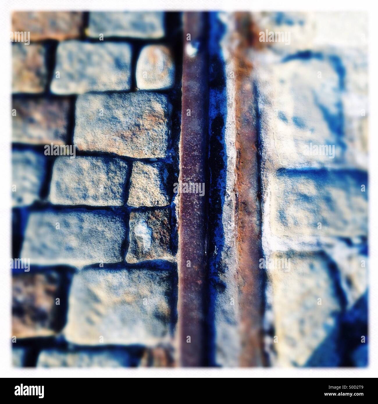 cobblestone detail and railway tracks Stock Photo - Alamy