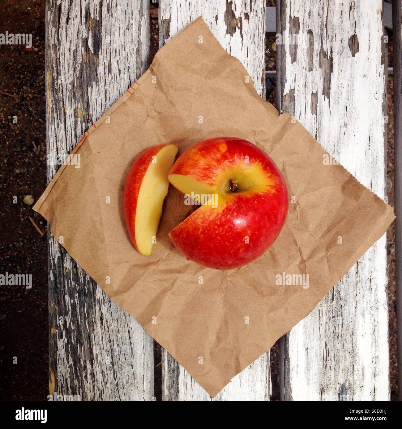 Red apple on brown hi-res stock photography and images - Alamy