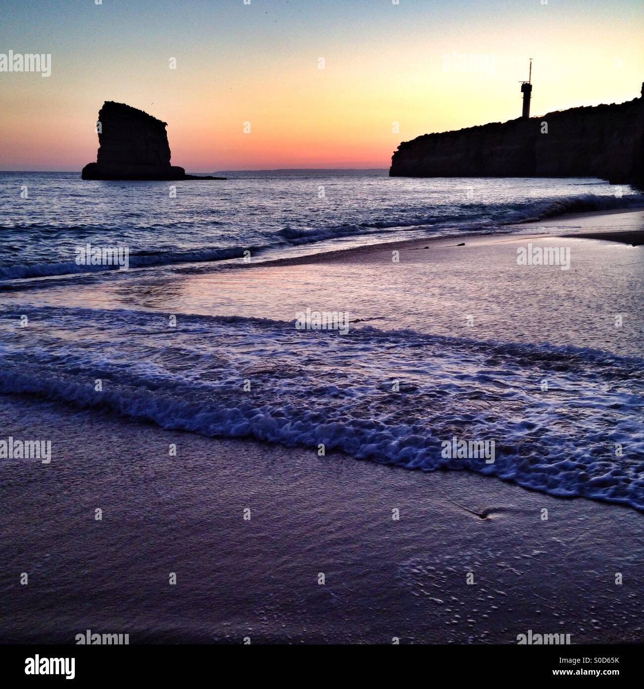 Sunset sea stack Stock Photo - Alamy