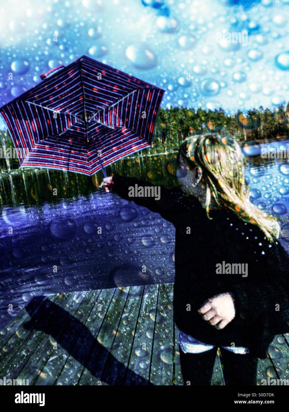 Child wind umbrella hi-res stock photography and images - Alamy