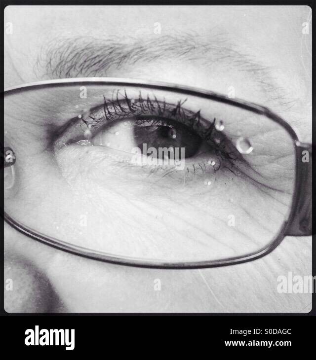 A woman's rain splattered glasses Stock Photo - Alamy