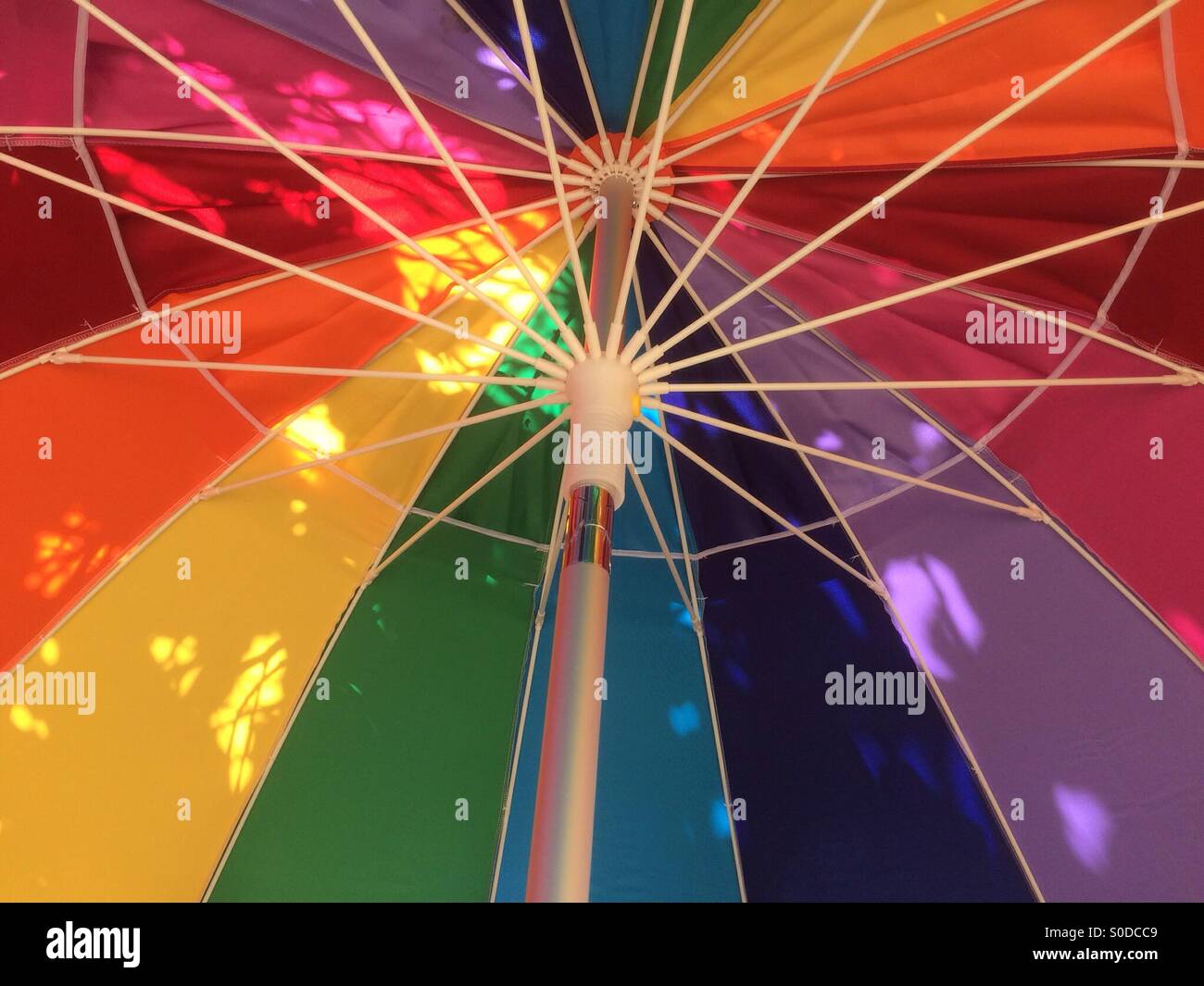 Umbrella rainbow colours Stock Photo - Alamy