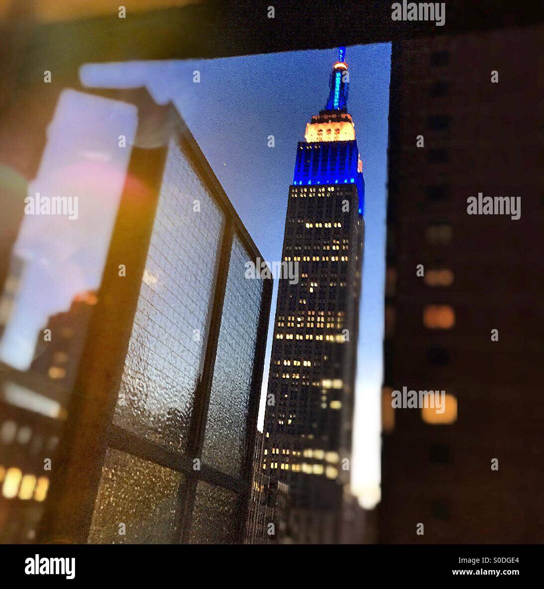 Empire state building through window hi-res stock photography and ...