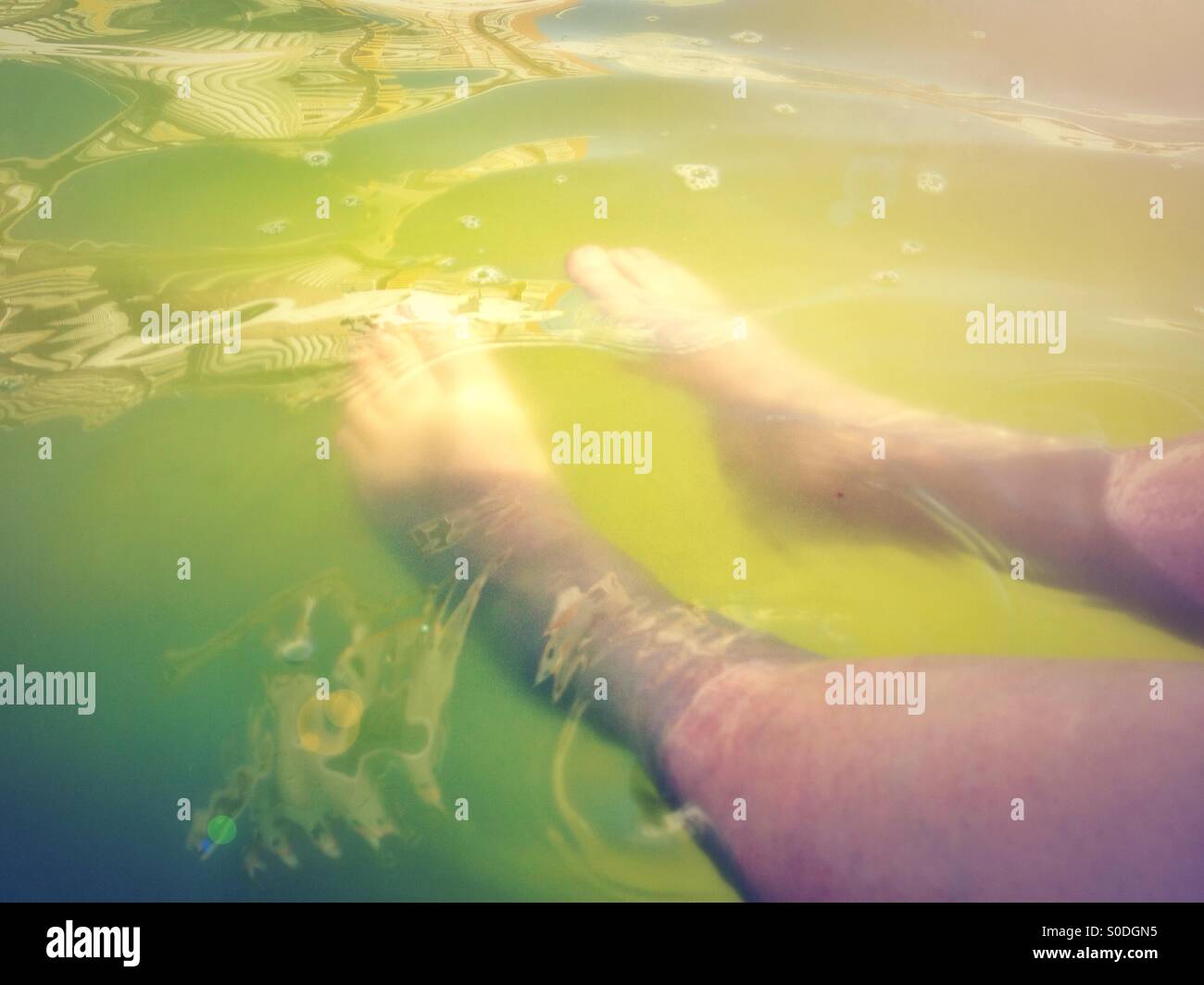 Feet in water hi-res stock photography and images - Alamy