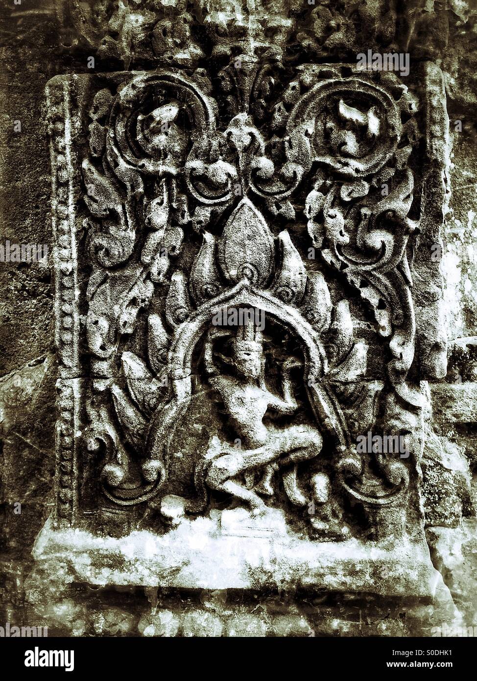 Ancient carving on a pillar at Ta Phrom Temple Cambodia Stock Photo - Alamy