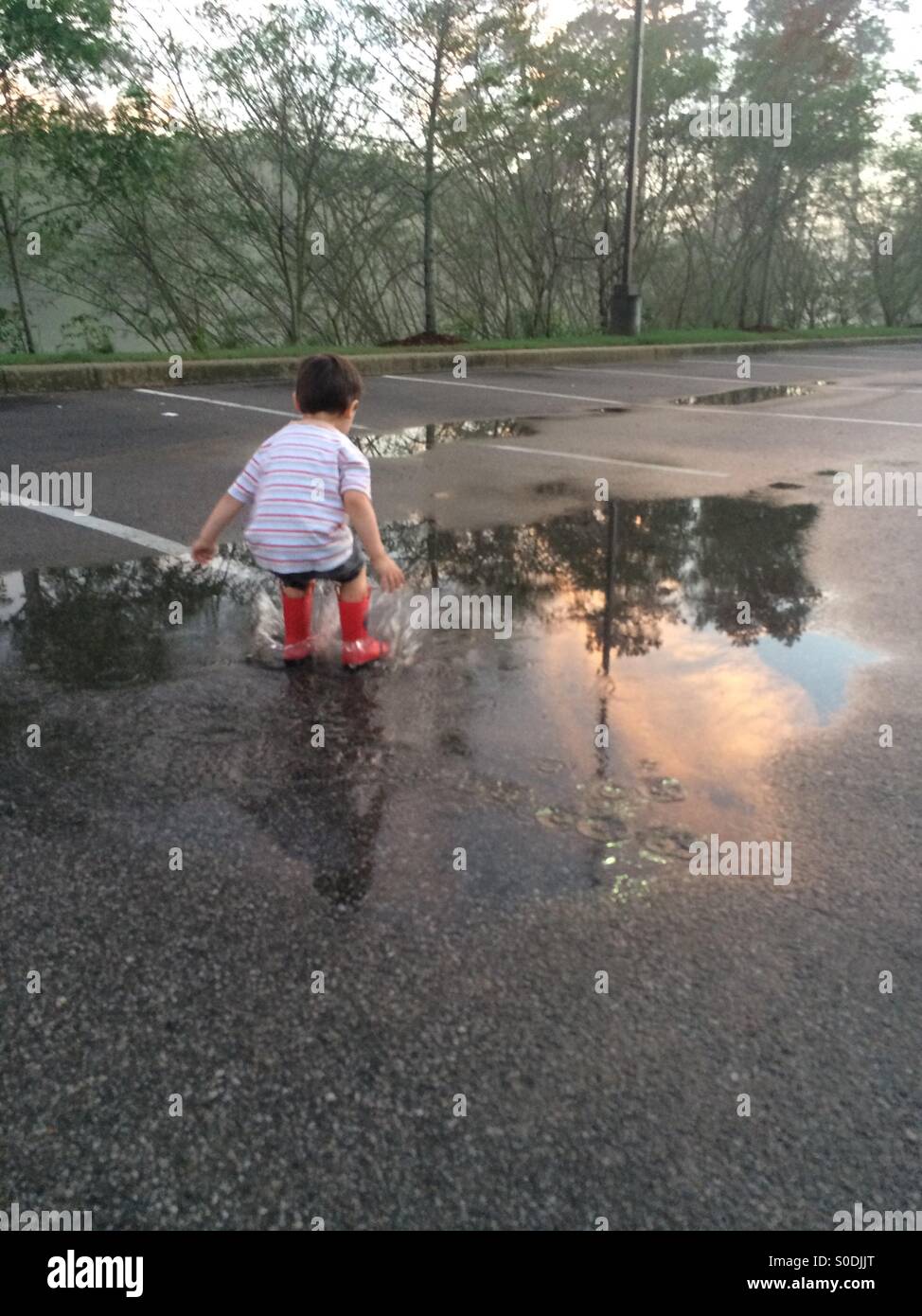 Puddle jumping hi-res stock photography and images - Alamy