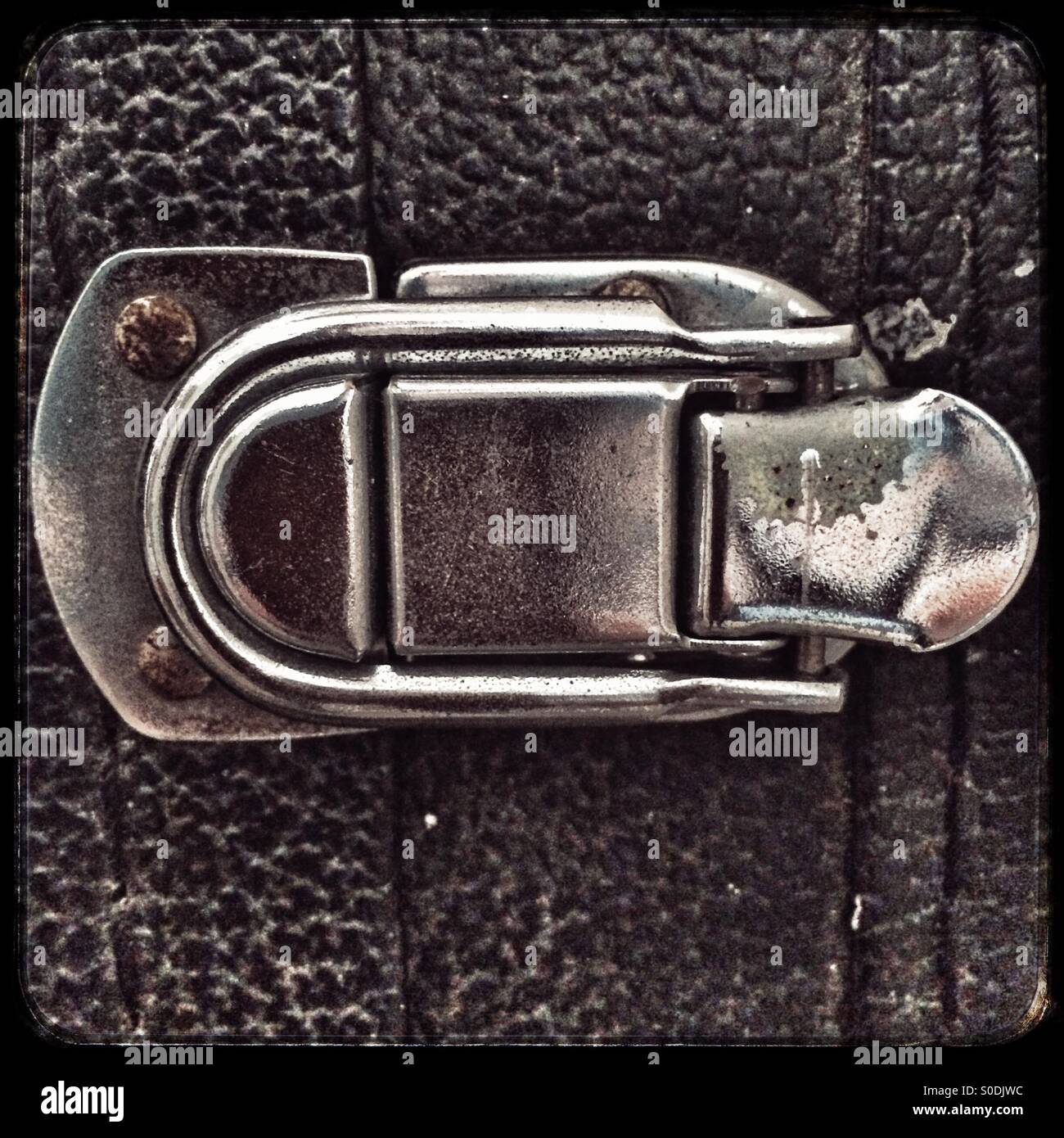 Clasp on guitar case Stock Photo - Alamy