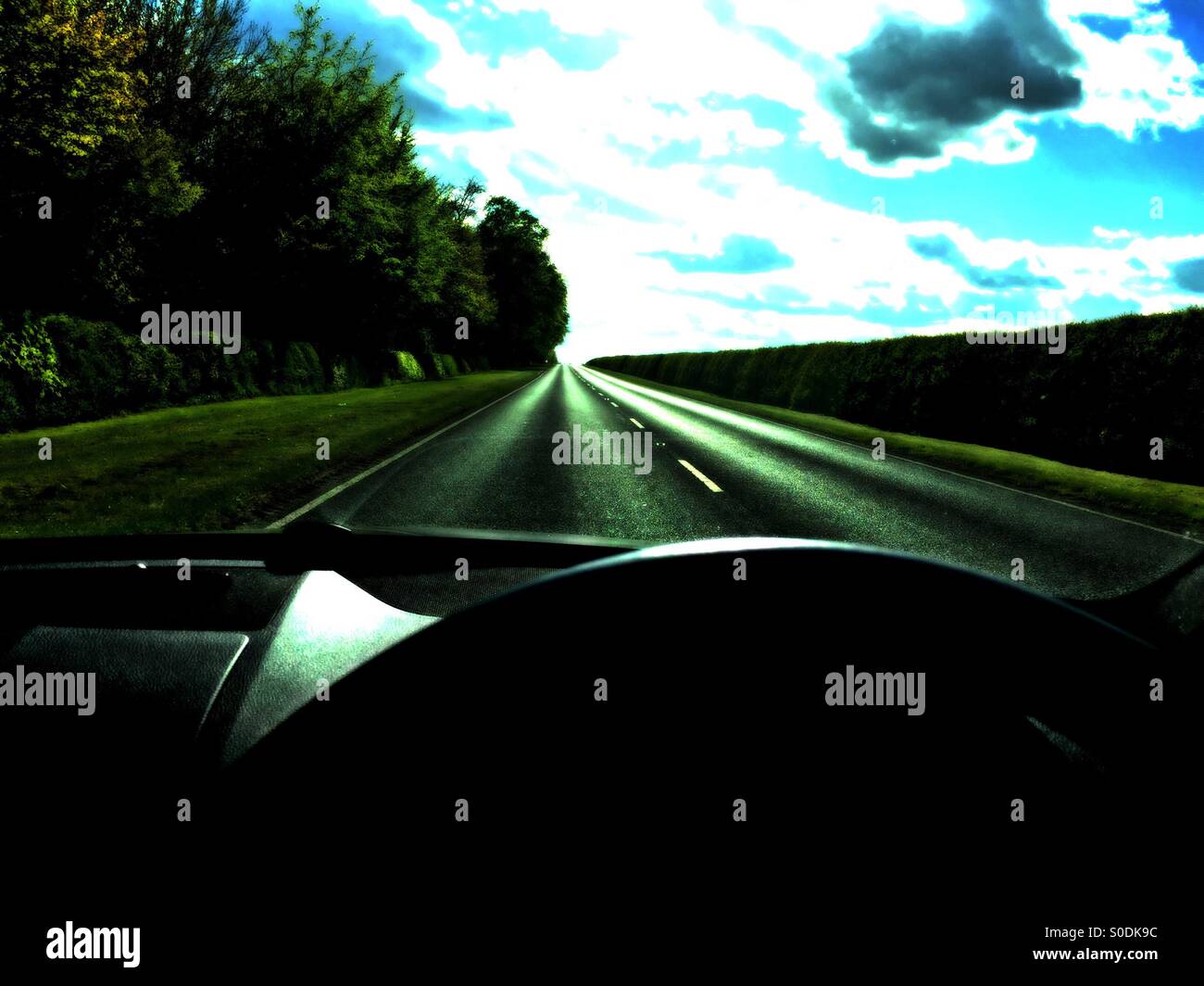 Car on empty road hi-res stock photography and images - Alamy