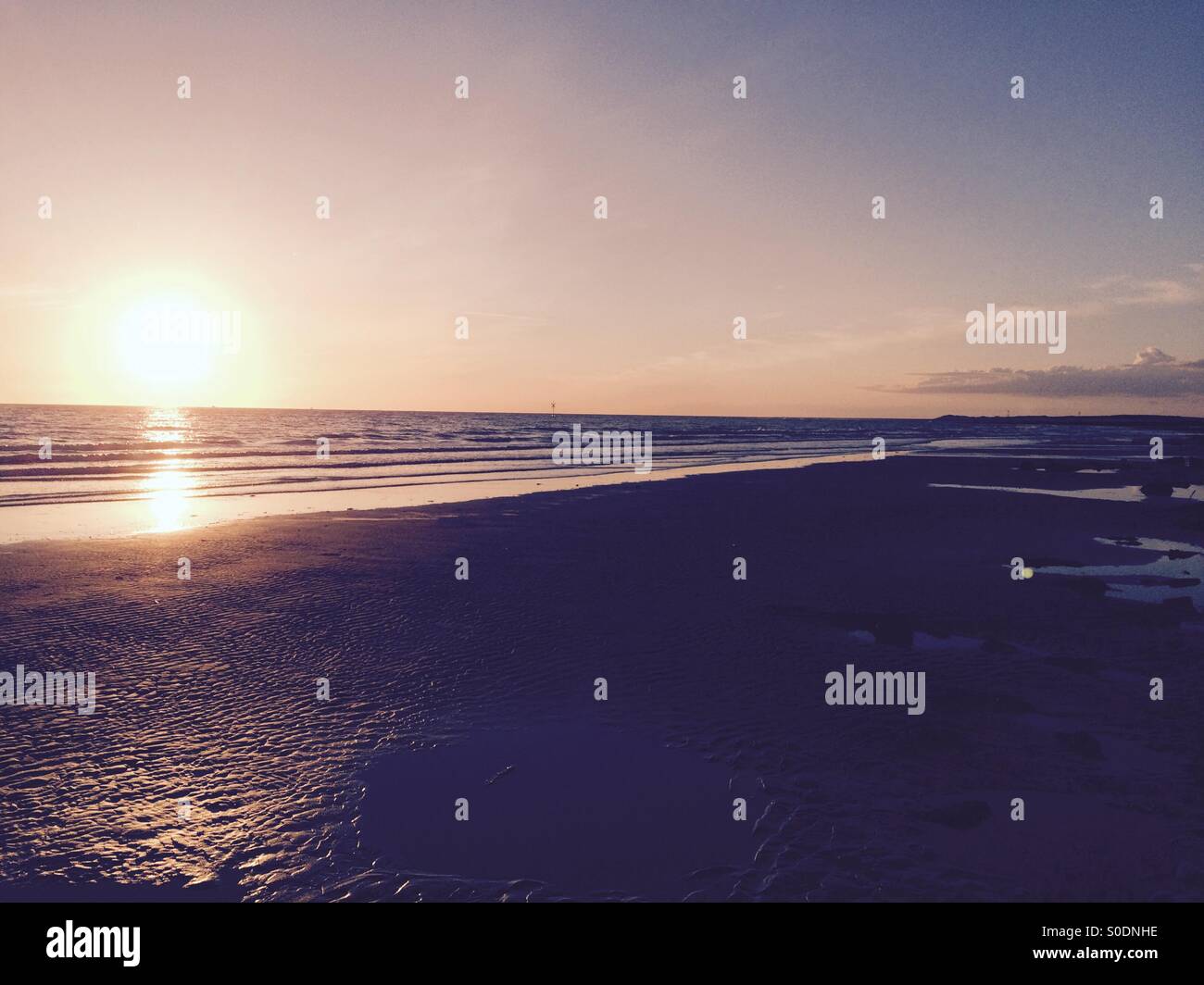 Crosby beach sunset Stock Photo - Alamy