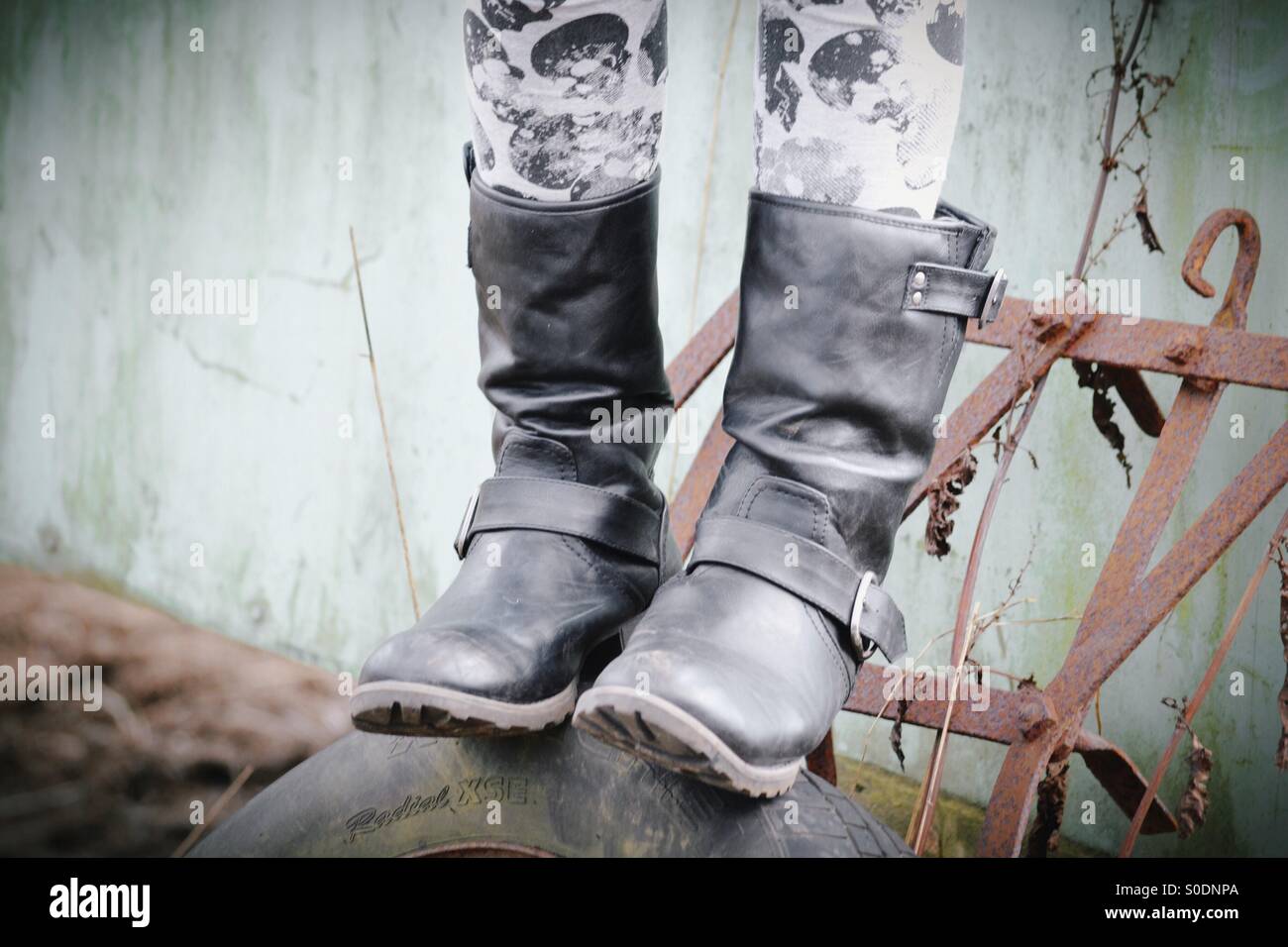 Boots on tire Stock Photo - Alamy