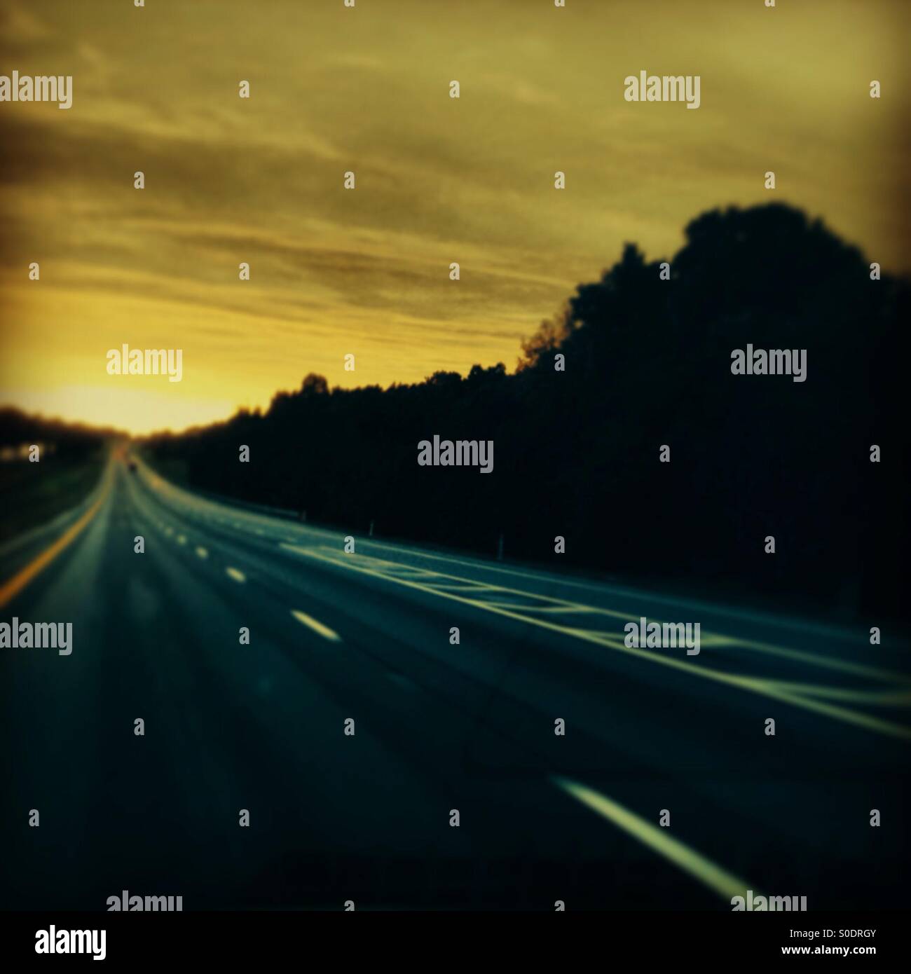 Driving into sunset hi-res stock photography and images - Alamy