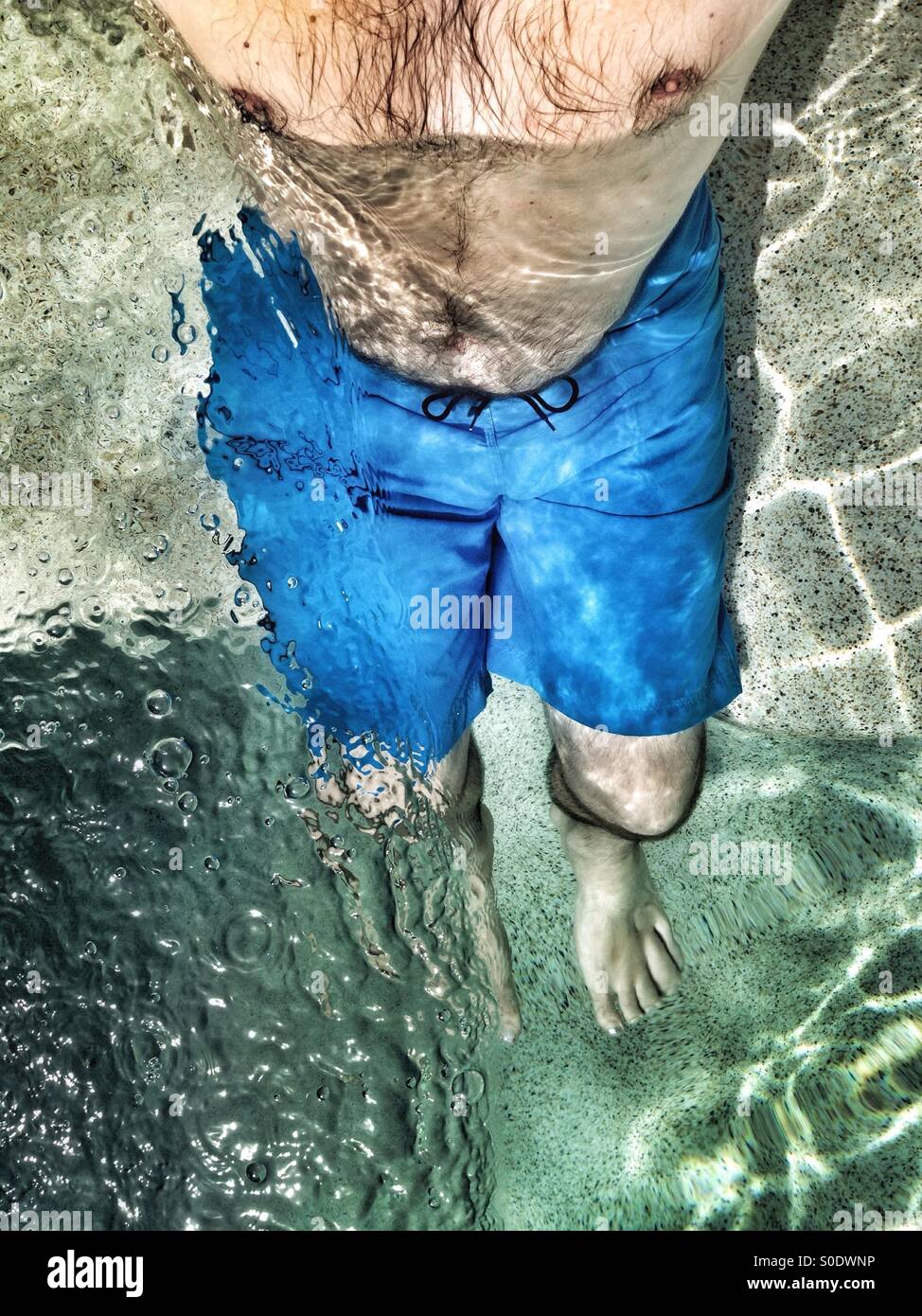 Man in a swimming pool Stock Photo - Alamy
