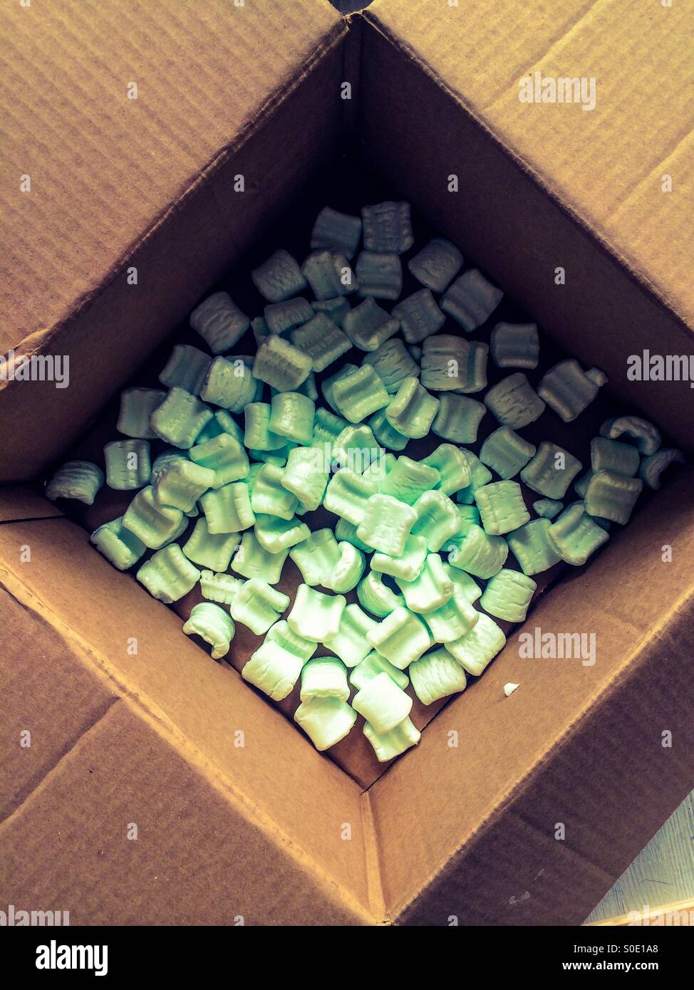 Box with packing peanuts Stock Photo - Alamy