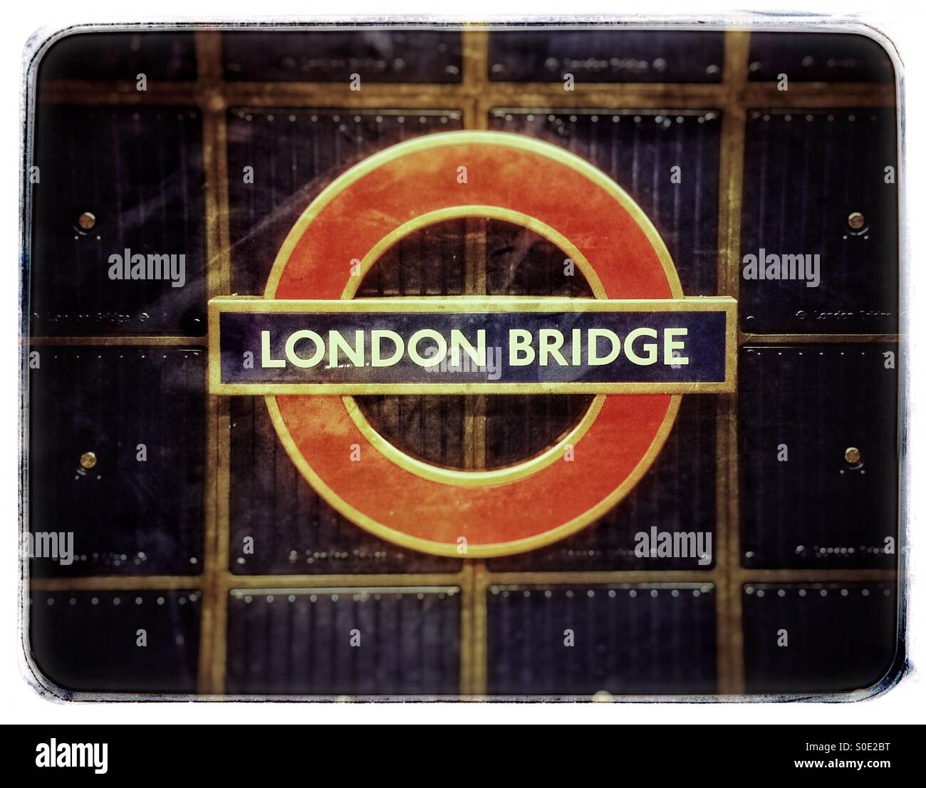 London Bridge tube train sign Stock Photo - Alamy