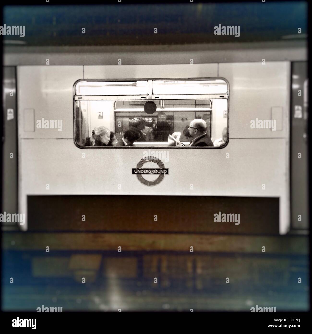 Busy london tube train hi-res stock photography and images - Alamy