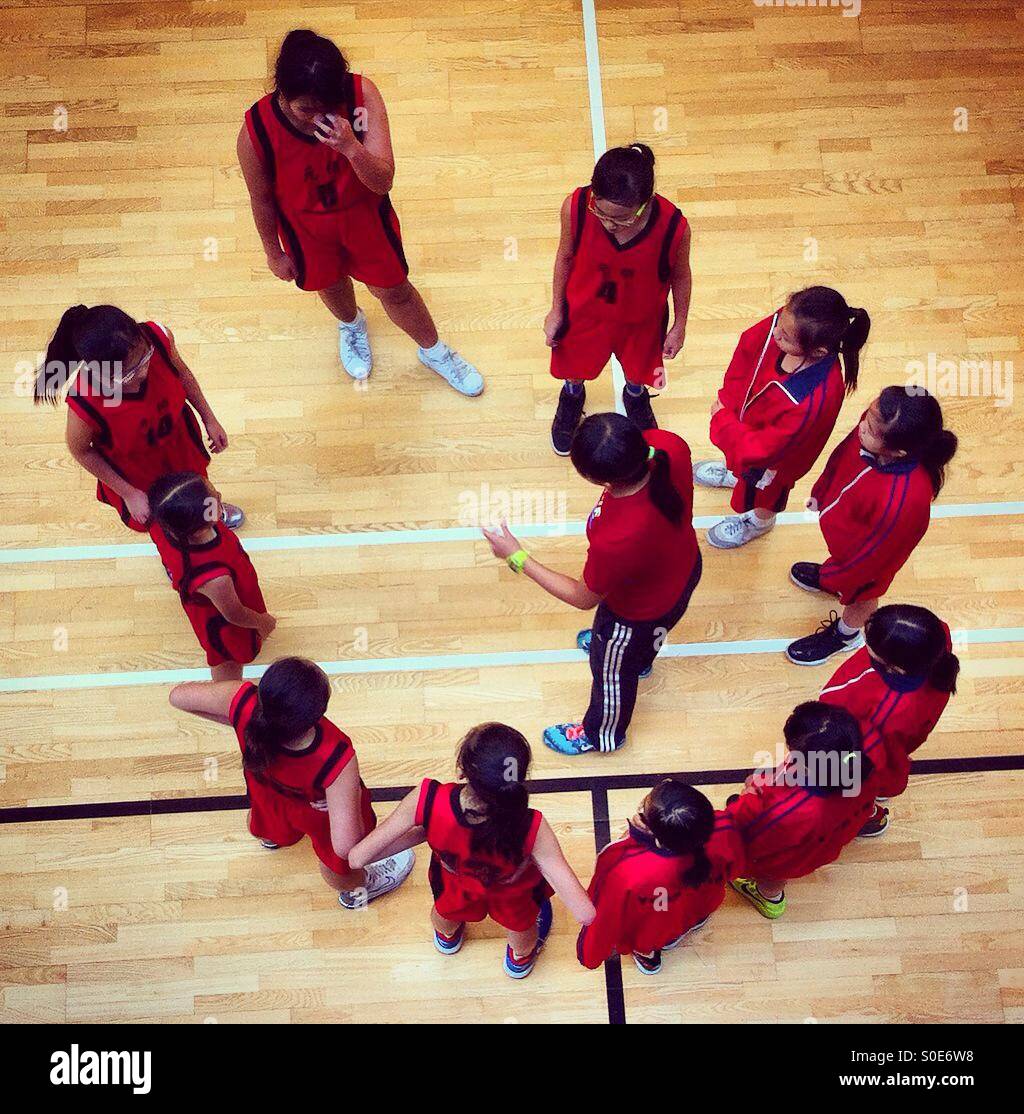 Coaching time during basketball match Stock Photo - Alamy