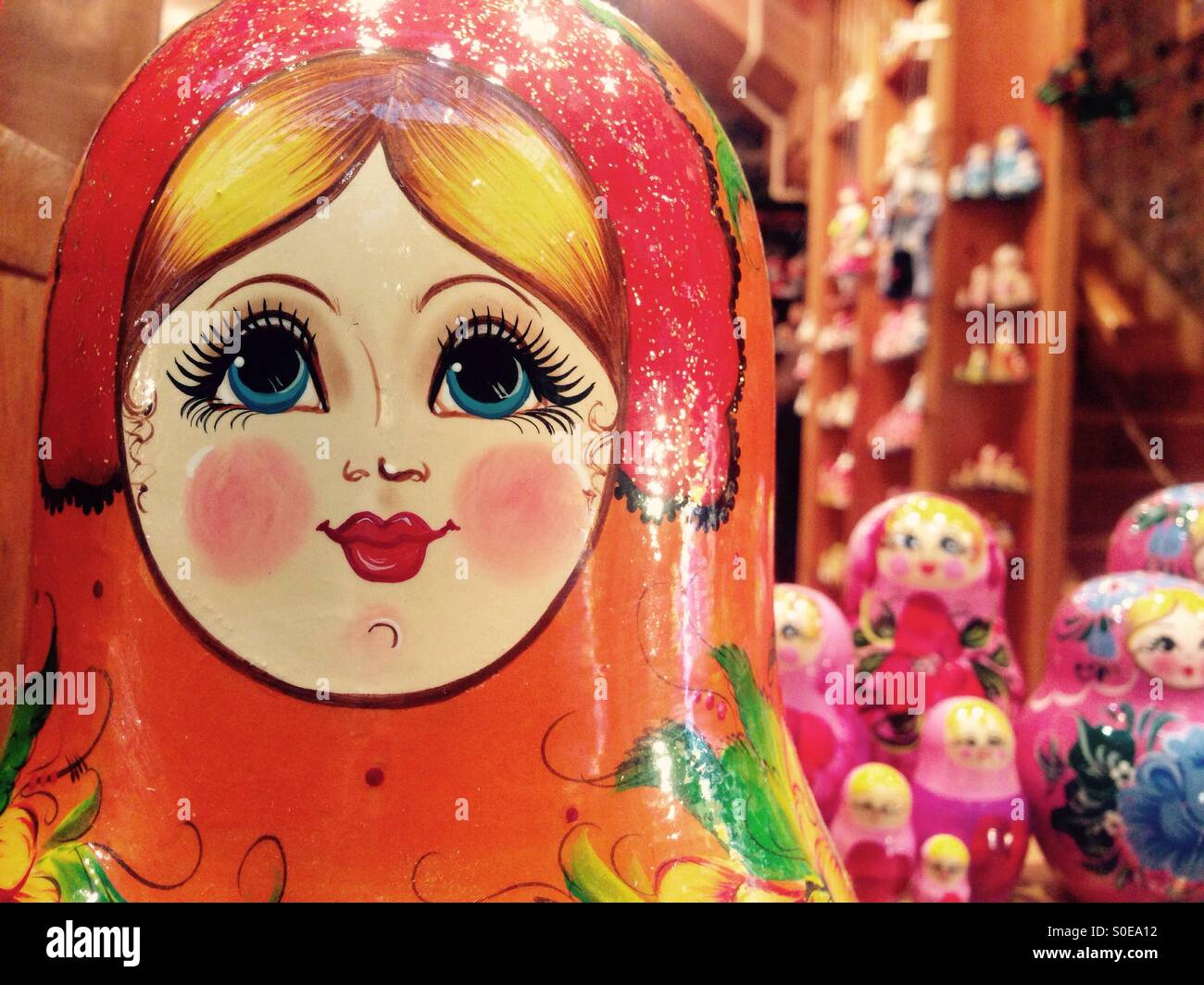 Babushka Doll Face with other Babushkas in background Stock Photo - Alamy