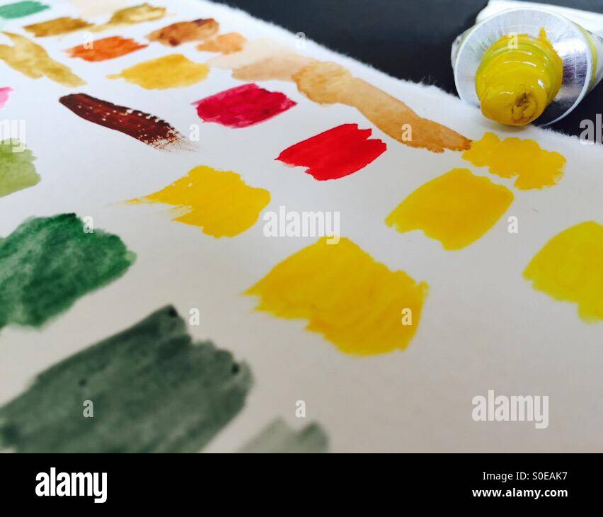 A painter tests his watercolors Stock Photo - Alamy