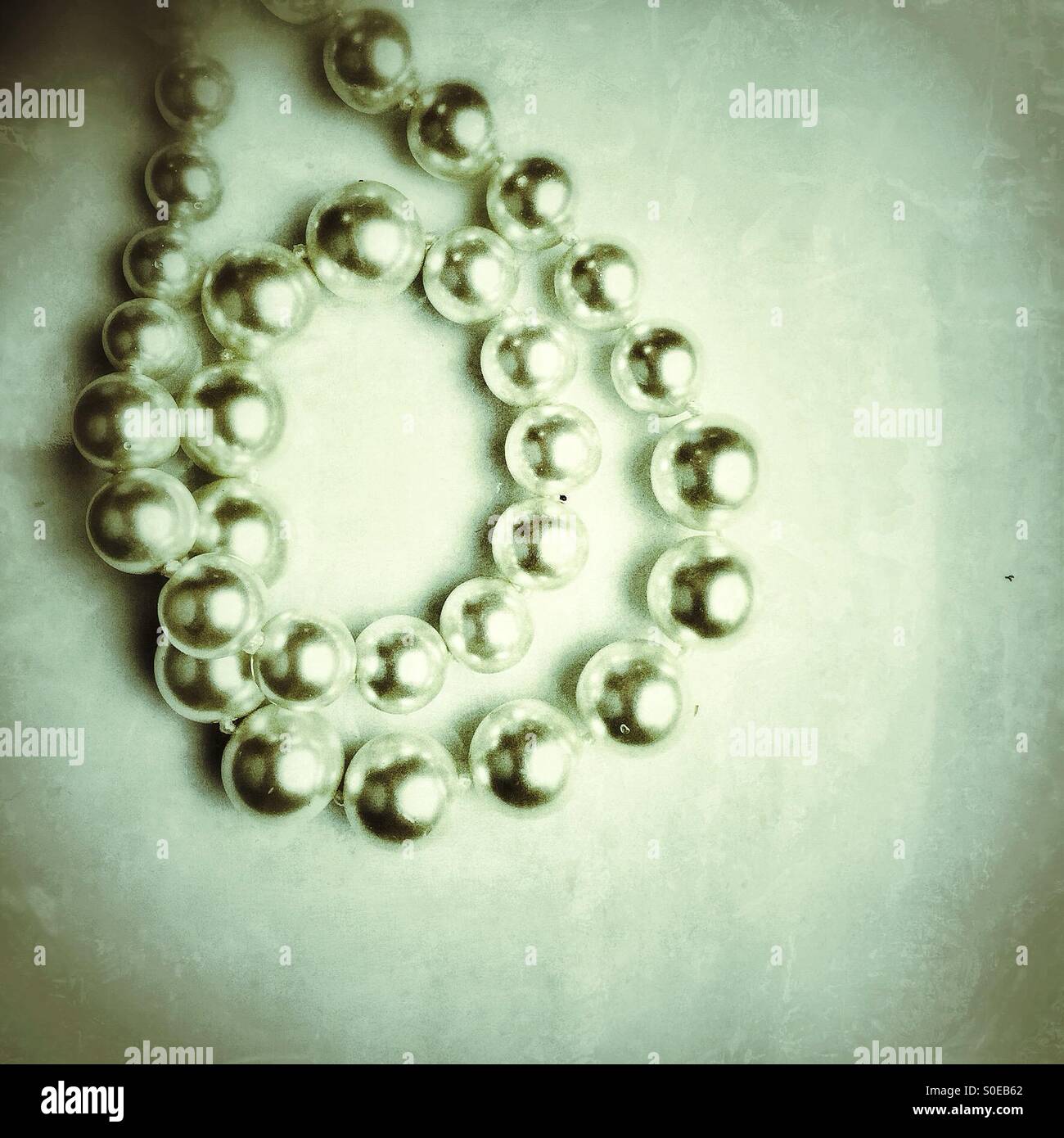 String of pearls Stock Photo - Alamy