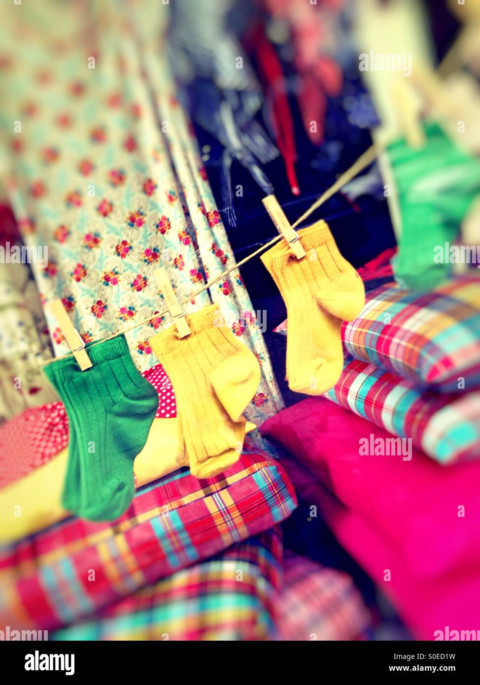 Children's socks in a Shop Display window Stock Photo - Alamy
