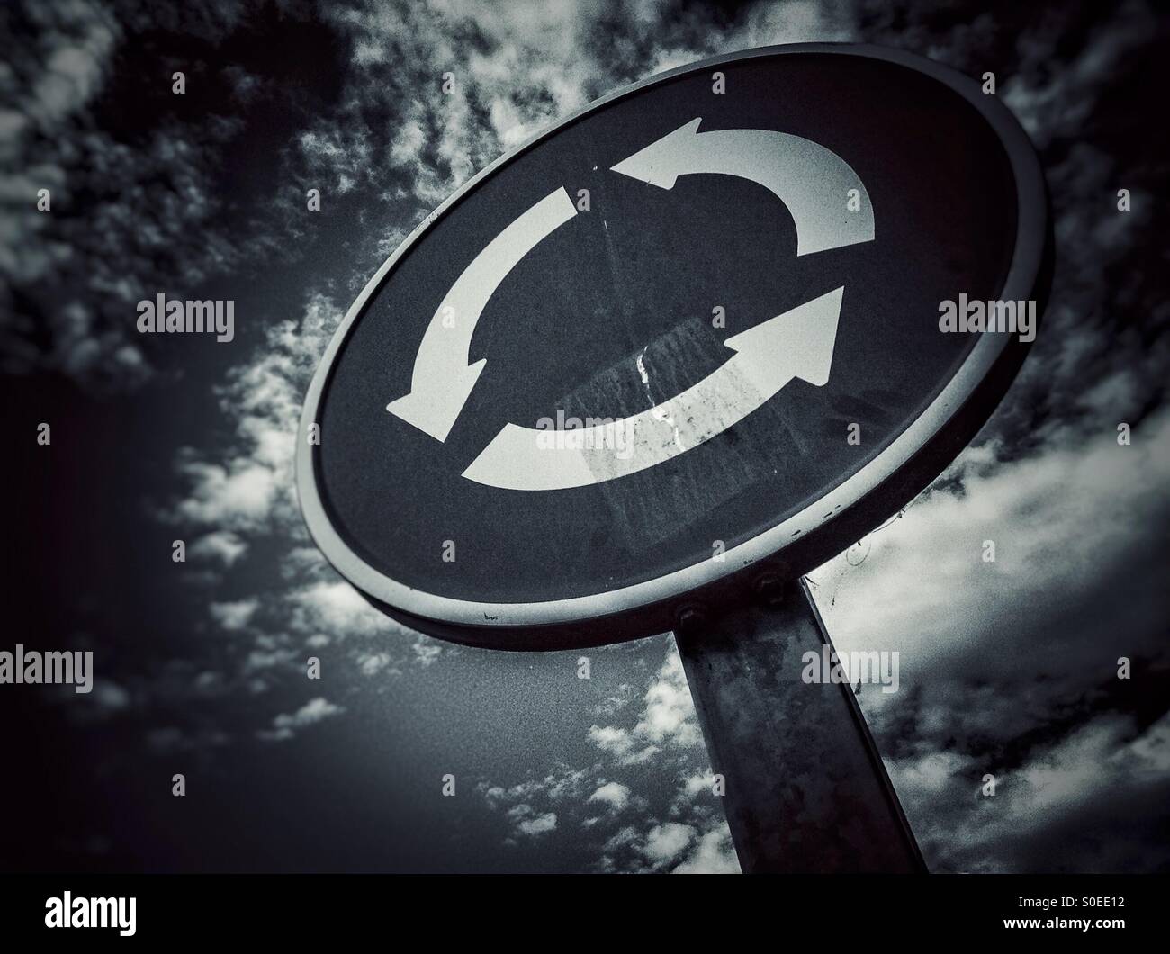 Roundabout traffic sign Stock Photo - Alamy