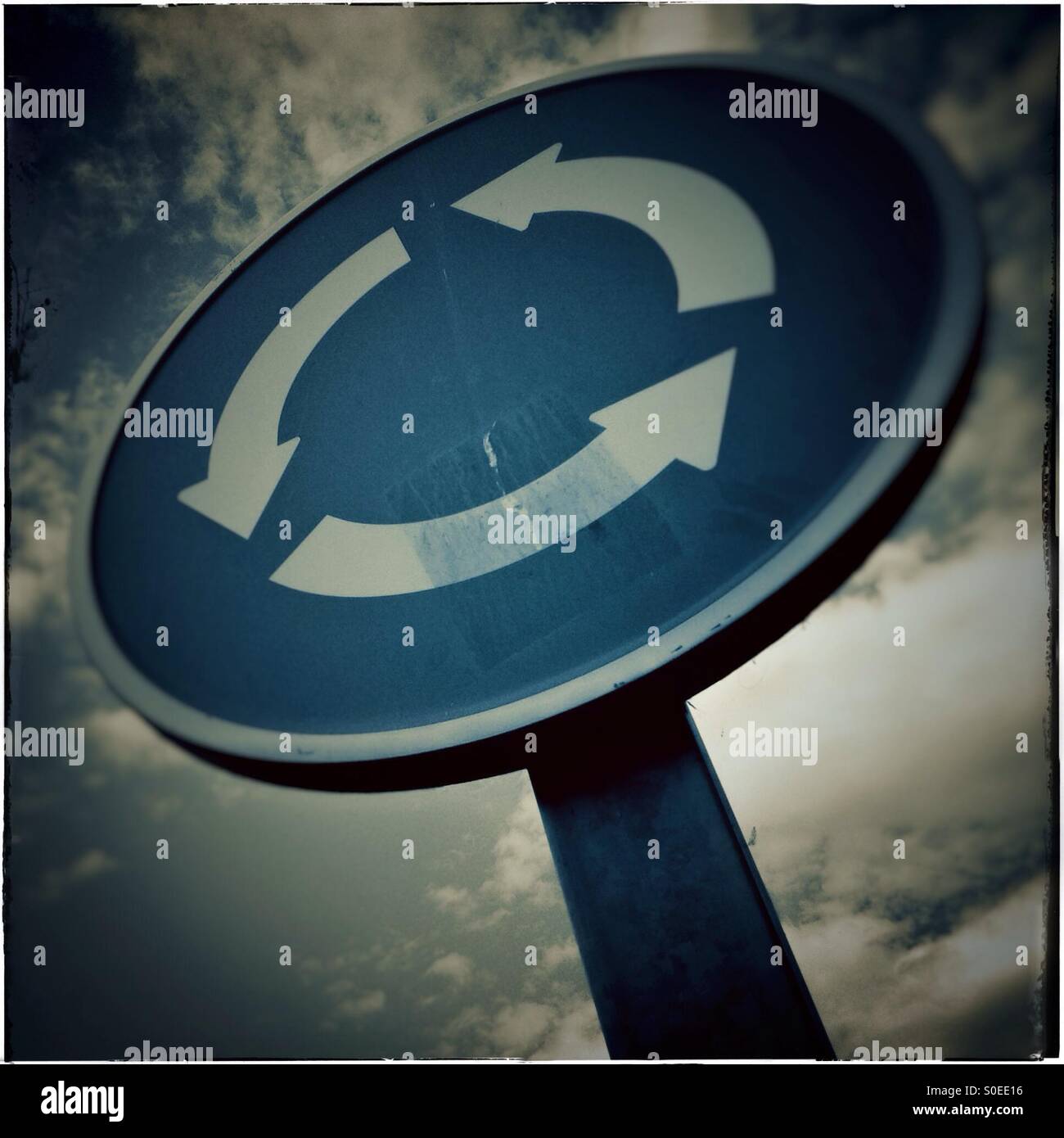 Roundabout traffic sign Stock Photo - Alamy