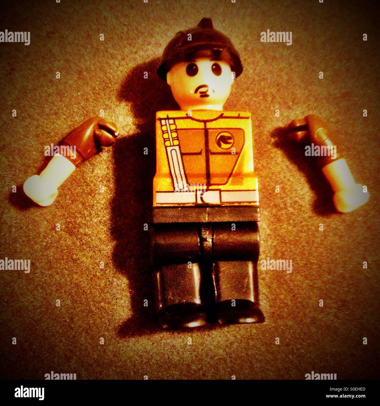 A little toy man with no arms Stock Photo - Alamy