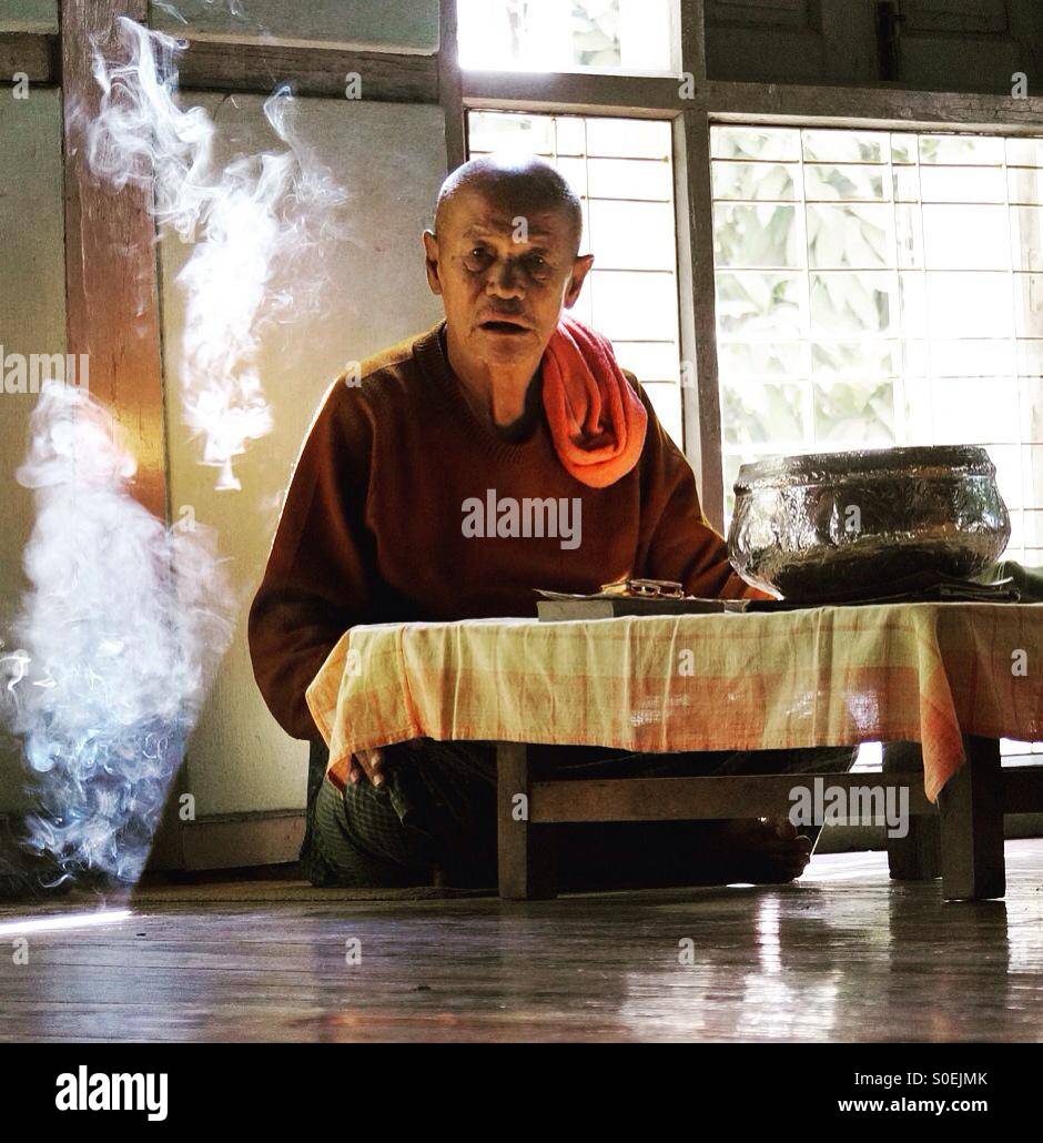 Monk smoking hi-res stock photography and images - Alamy