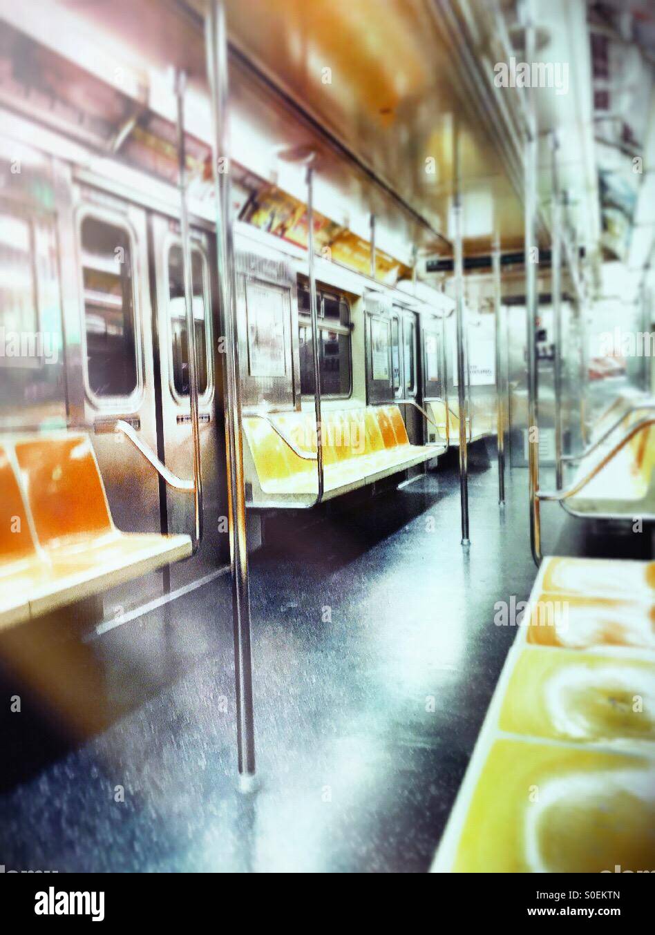 Inside subway train new york smartphone stock photos and images - Alamy