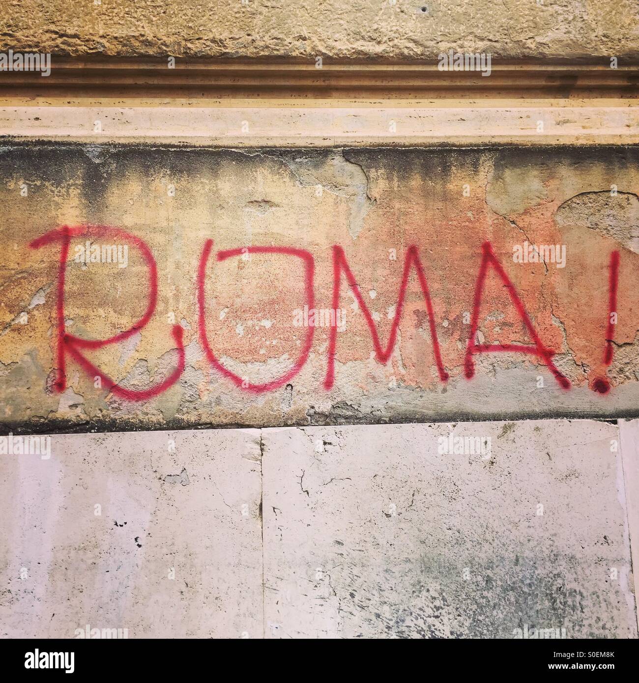 Roma on the wall in Rome Italy Stock Photo - Alamy