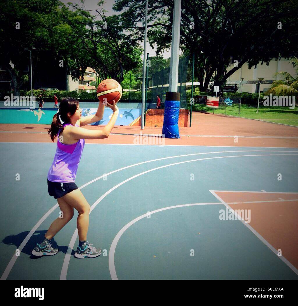 Girl throw ball hi-res stock photography and images - Alamy