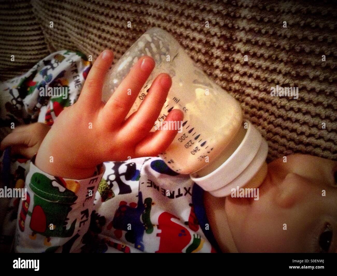 A toddler drinking his bedtime milk Stock Photo - Alamy