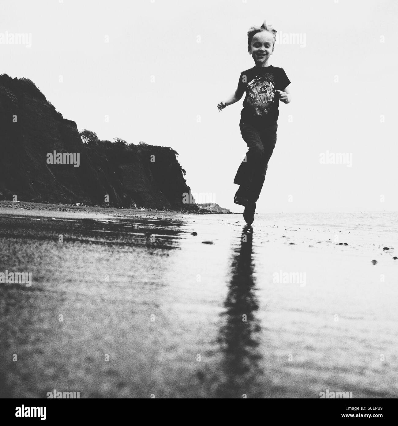 Boy jogging hi-res stock photography and images - Alamy
