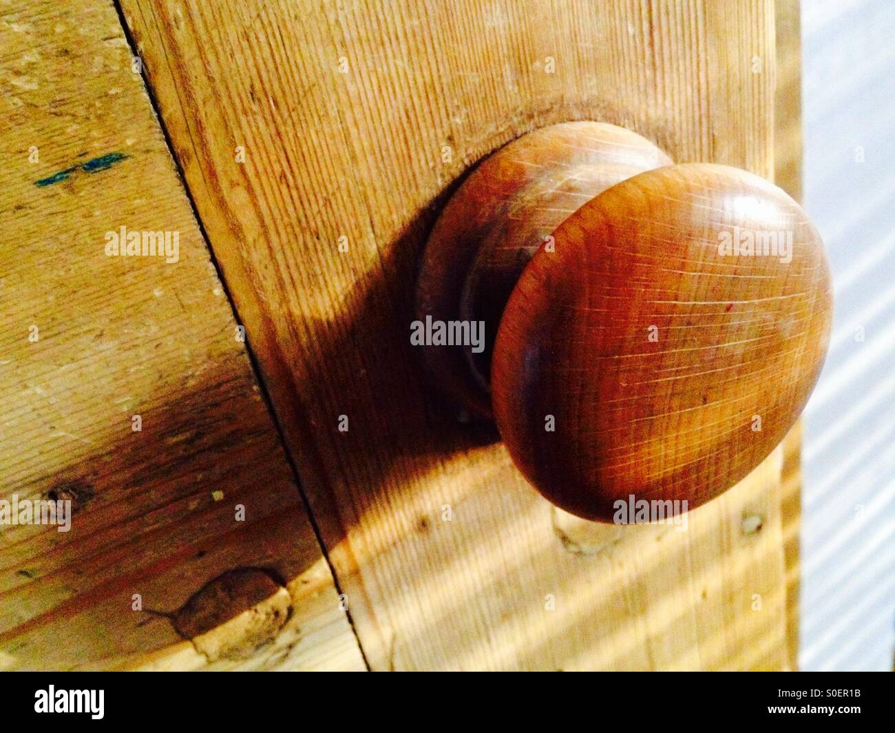 Wooden door knob Stock Photo - Alamy