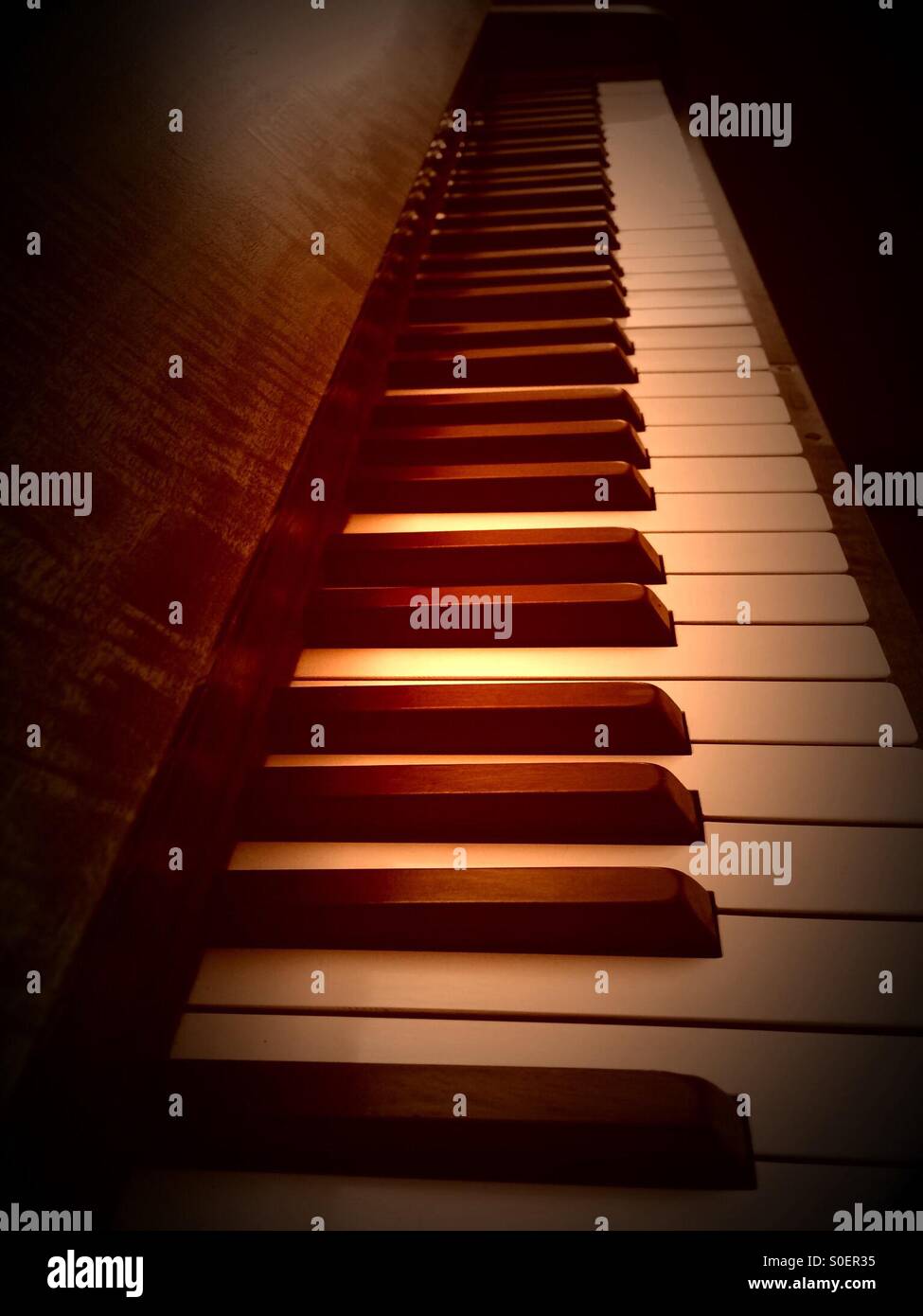 Piano keyboard with vintage filter Stock Photo - Alamy