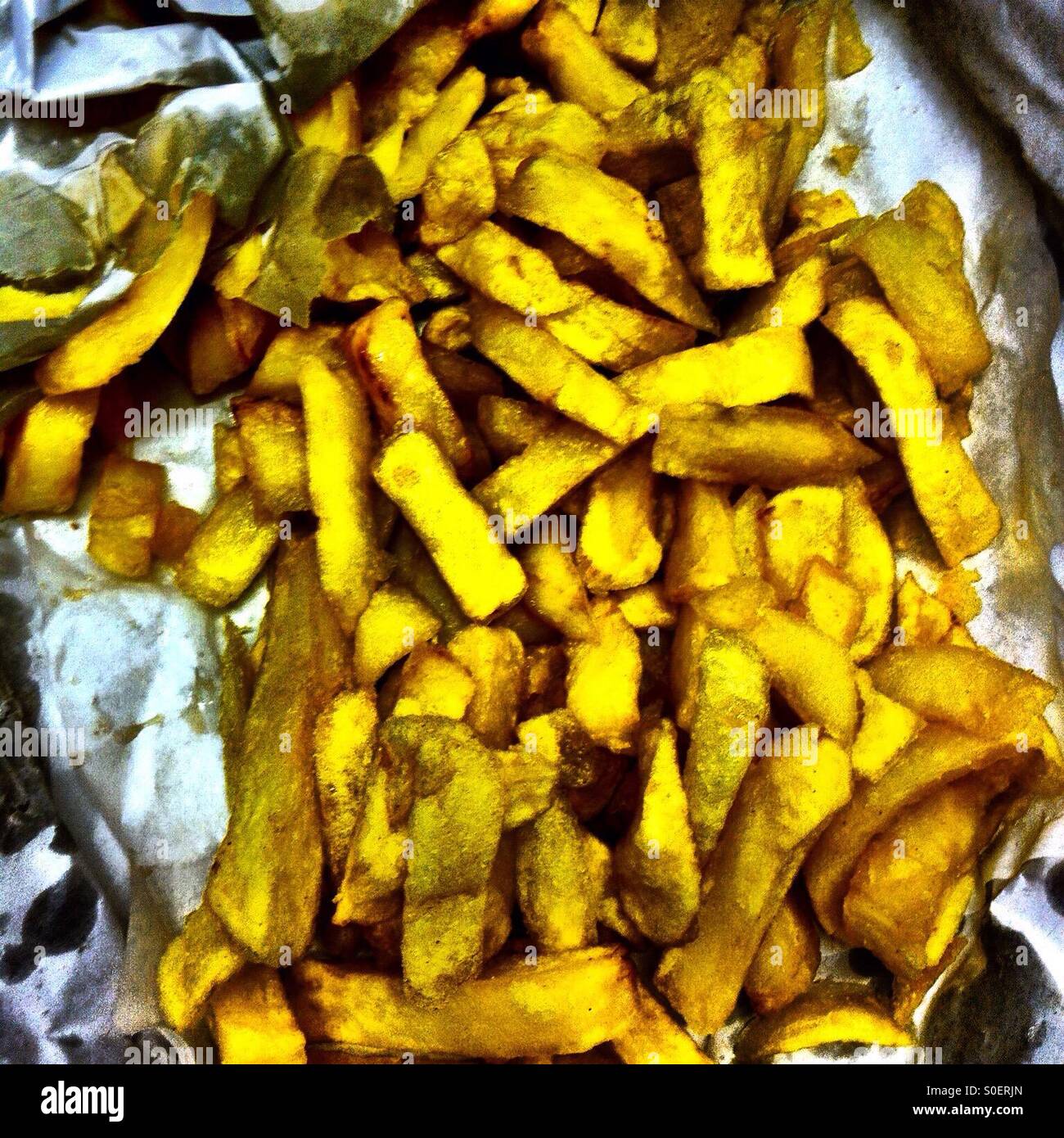 Chips served in paper Stock Photo - Alamy