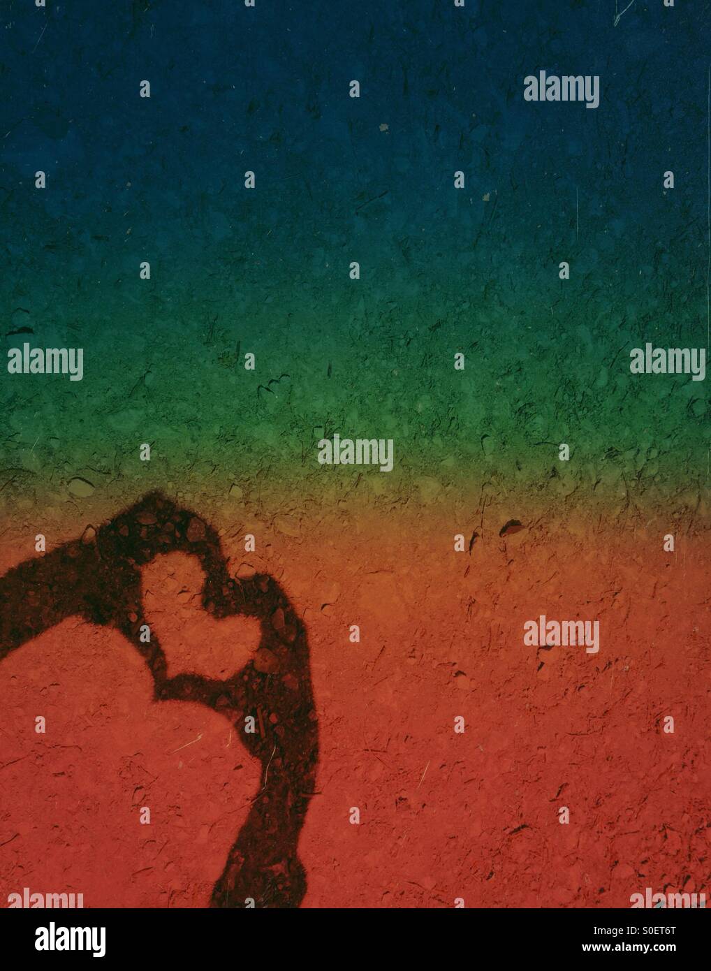 Hands forming heart shape shadow Stock Photo - Alamy