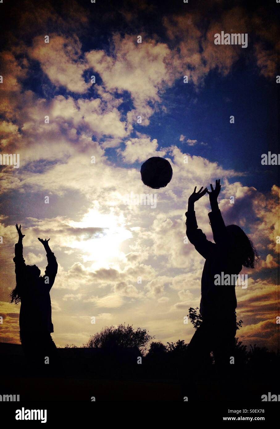Two girls playing catch Stock Photo - Alamy Two girls playing catch Stock Photo - Alamy