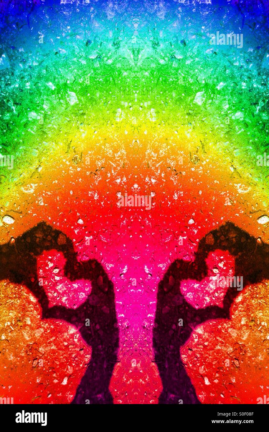 Heart shadow made by hands Stock Photo - Alamy