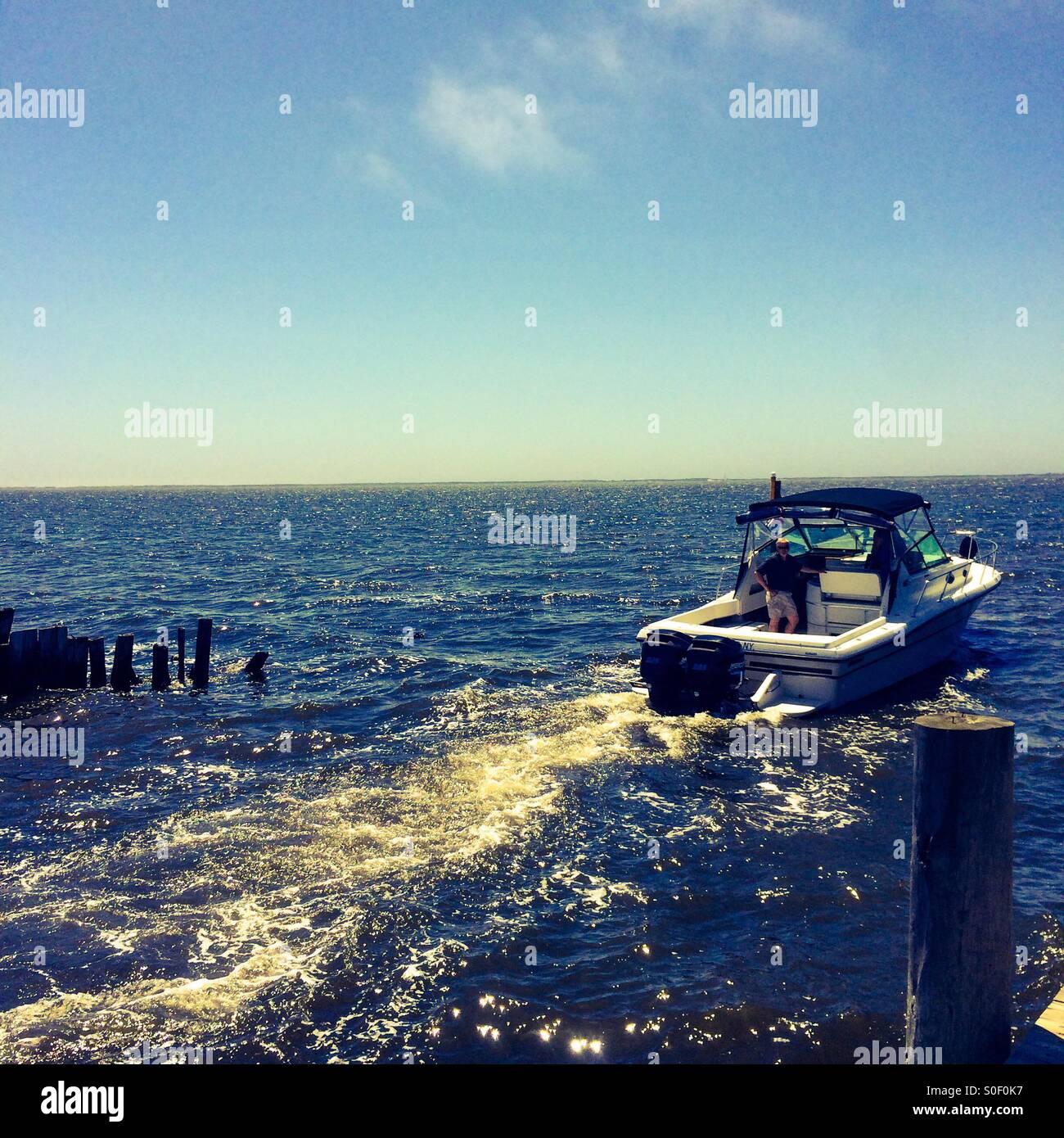Waves boat hi-res stock photography and images - Alamy