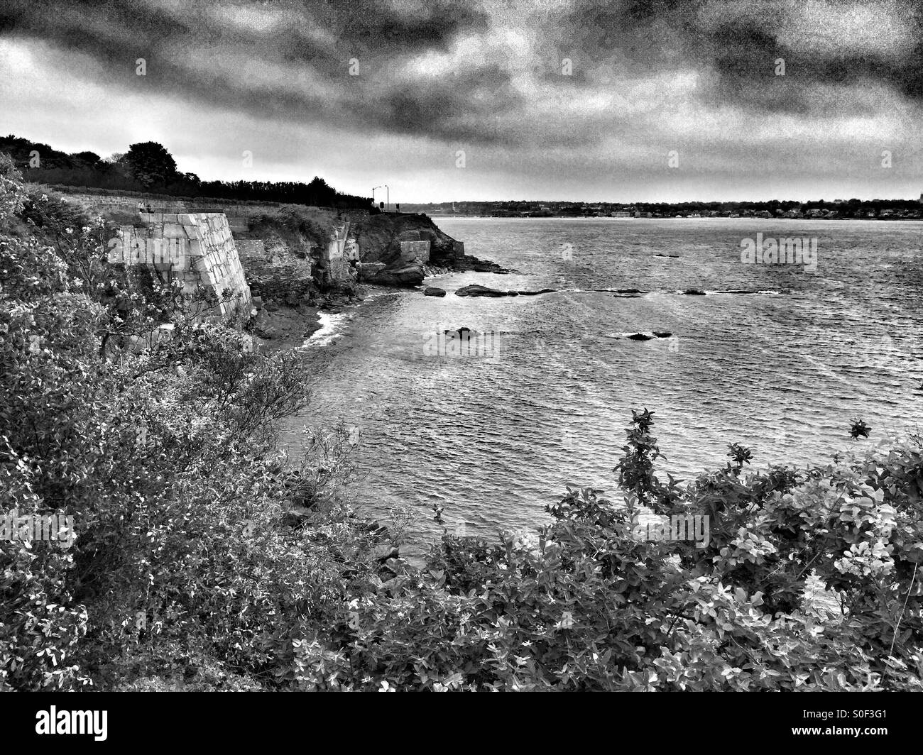 Rocky beach line Stock Photo - Alamy