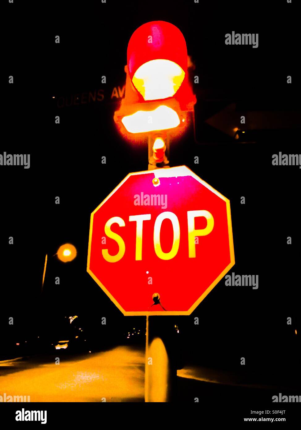 STOP sign with light Stock Photo - Alamy
