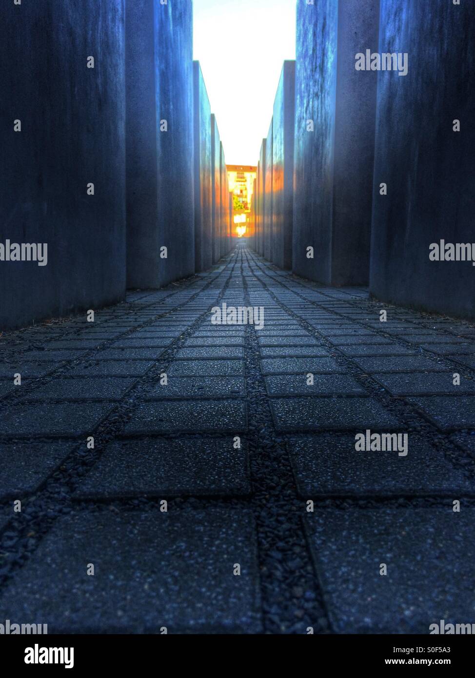 Narrow path between concrete blocks Stock Photo - Alamy Narrow path between concrete blocks Stock Photo - Alamy